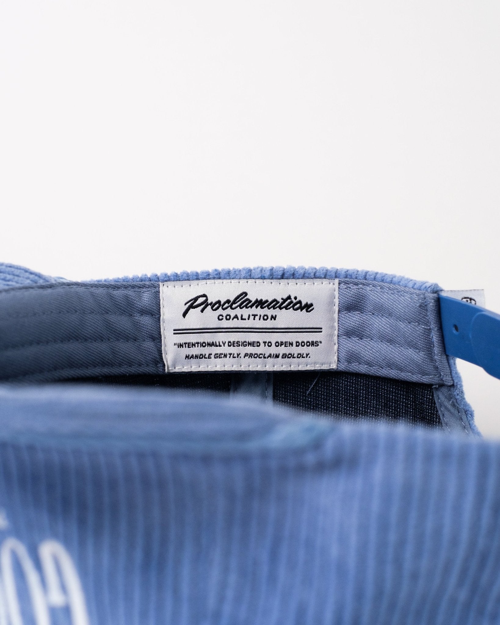 "Good News" - Ocean Blue Corduroy Hat – Proclamation Coalition
